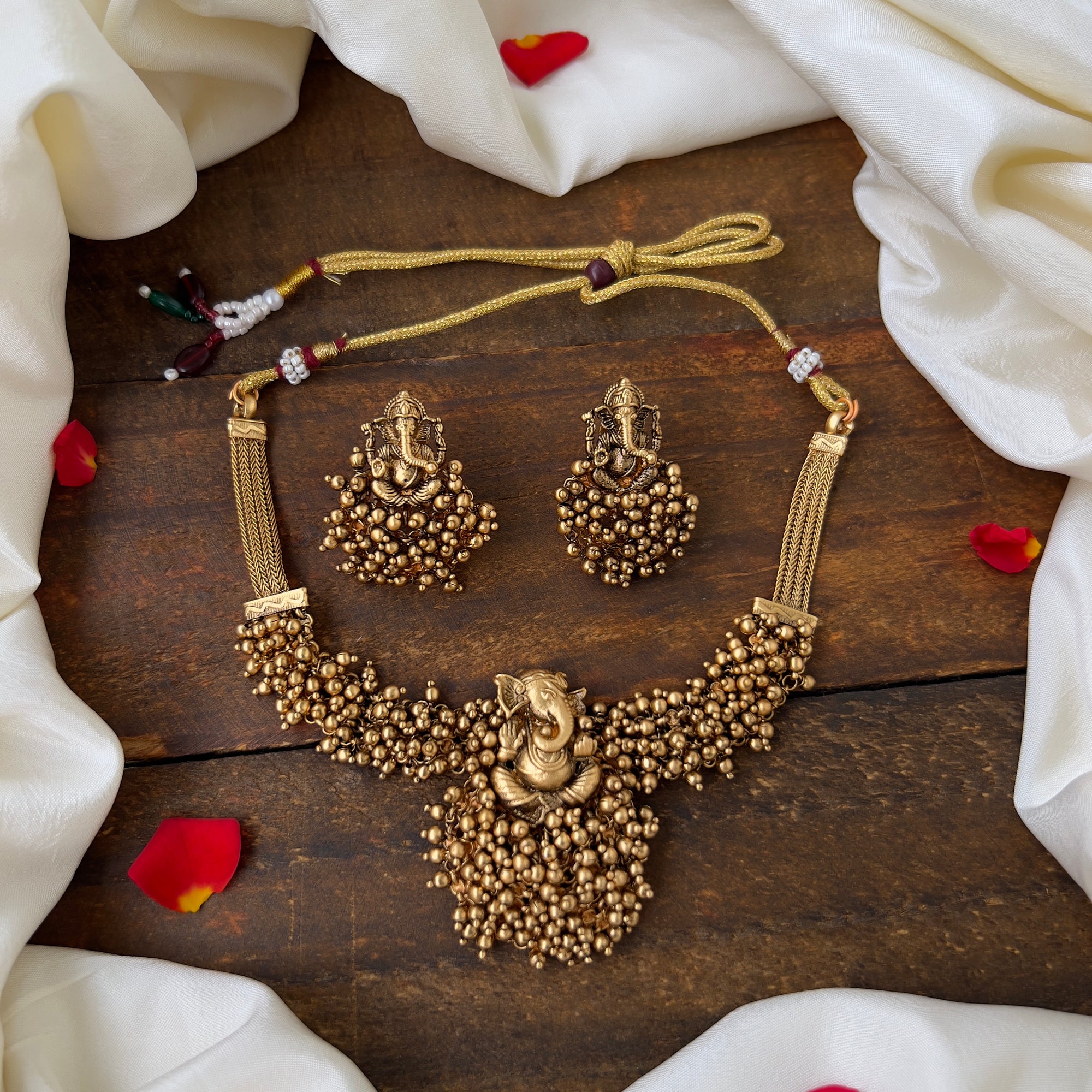 Antique Gold Matte Beads Ganesha Choker Set: Exquisite Traditional Bea